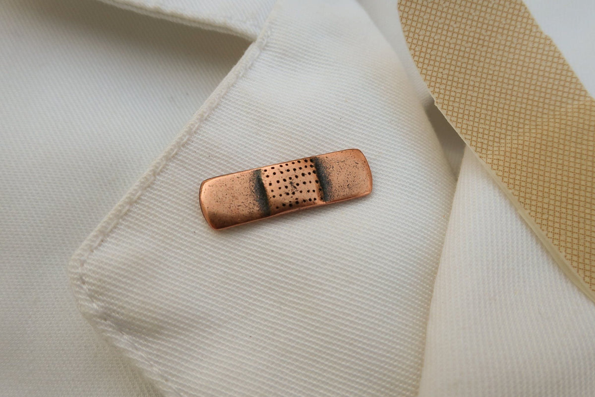 Band-Aid Copper Lapel Pin - Healing with Style | Lapel Pin Planet ...