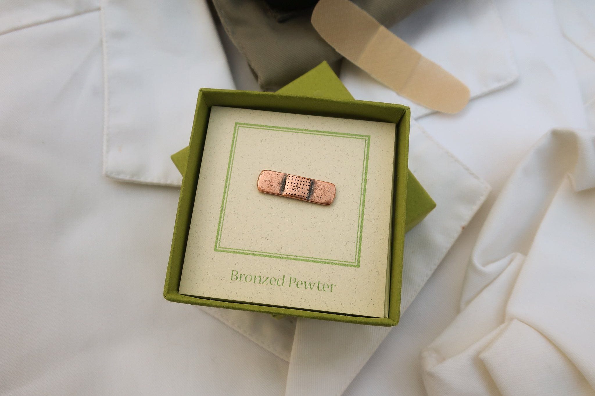 Band-Aid Copper Lapel Pin - Healing with Style | Lapel Pin Planet ...