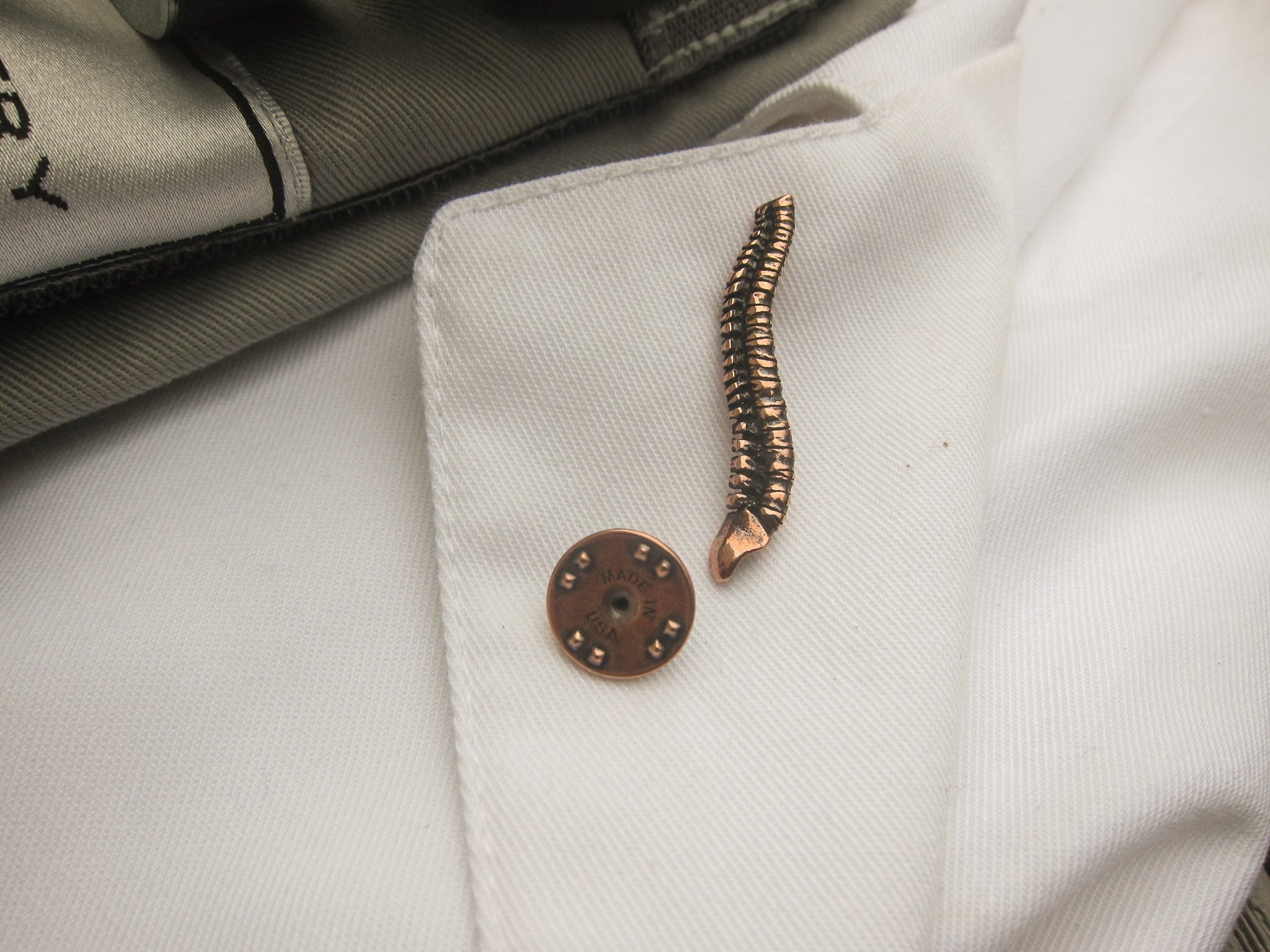 Spine Copper Lapel Pin – lapelpinplanet