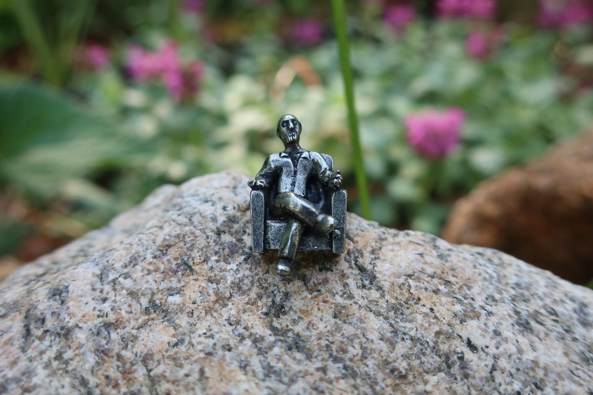 Guy in Chair Lapel Pin – lapelpinplanet