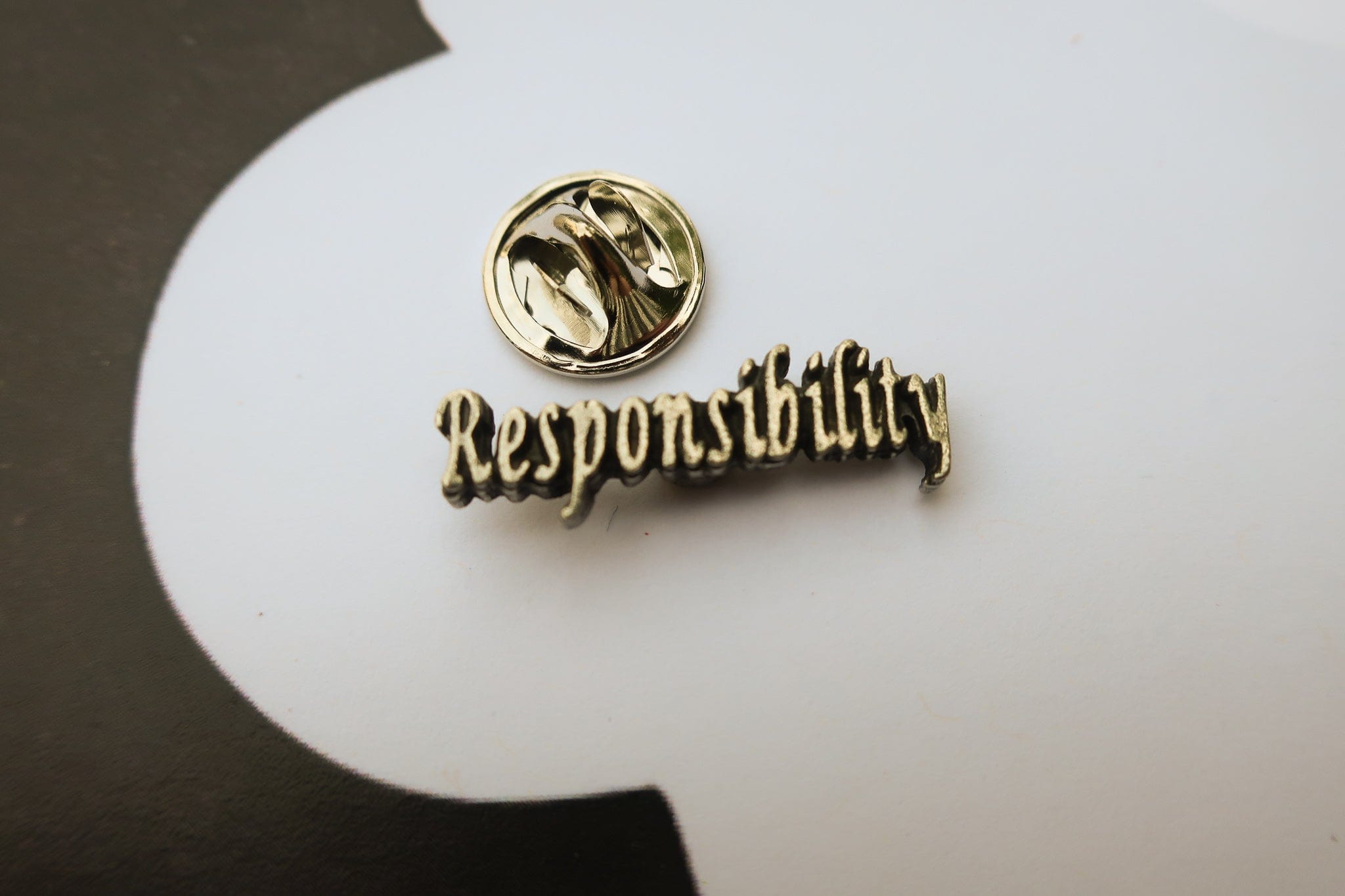 Responsibility Lapel Pin – lapelpinplanet