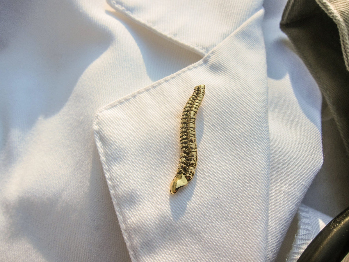 Spine Gold Lapel Pin – lapelpinplanet